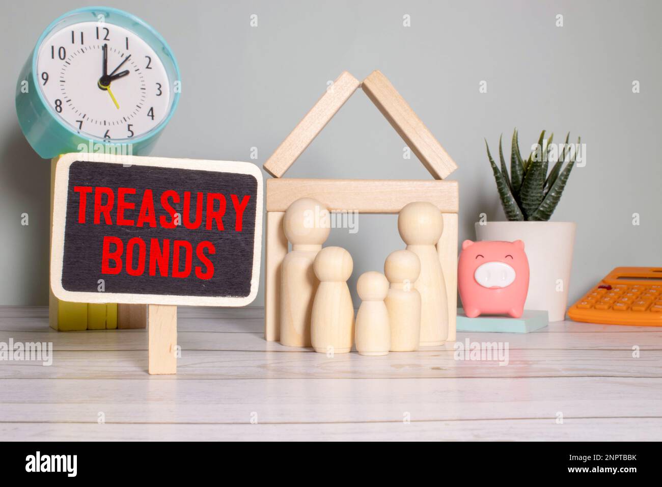 TREASURY BONDS text on paper with magnifier, coffee and keyboard on ...