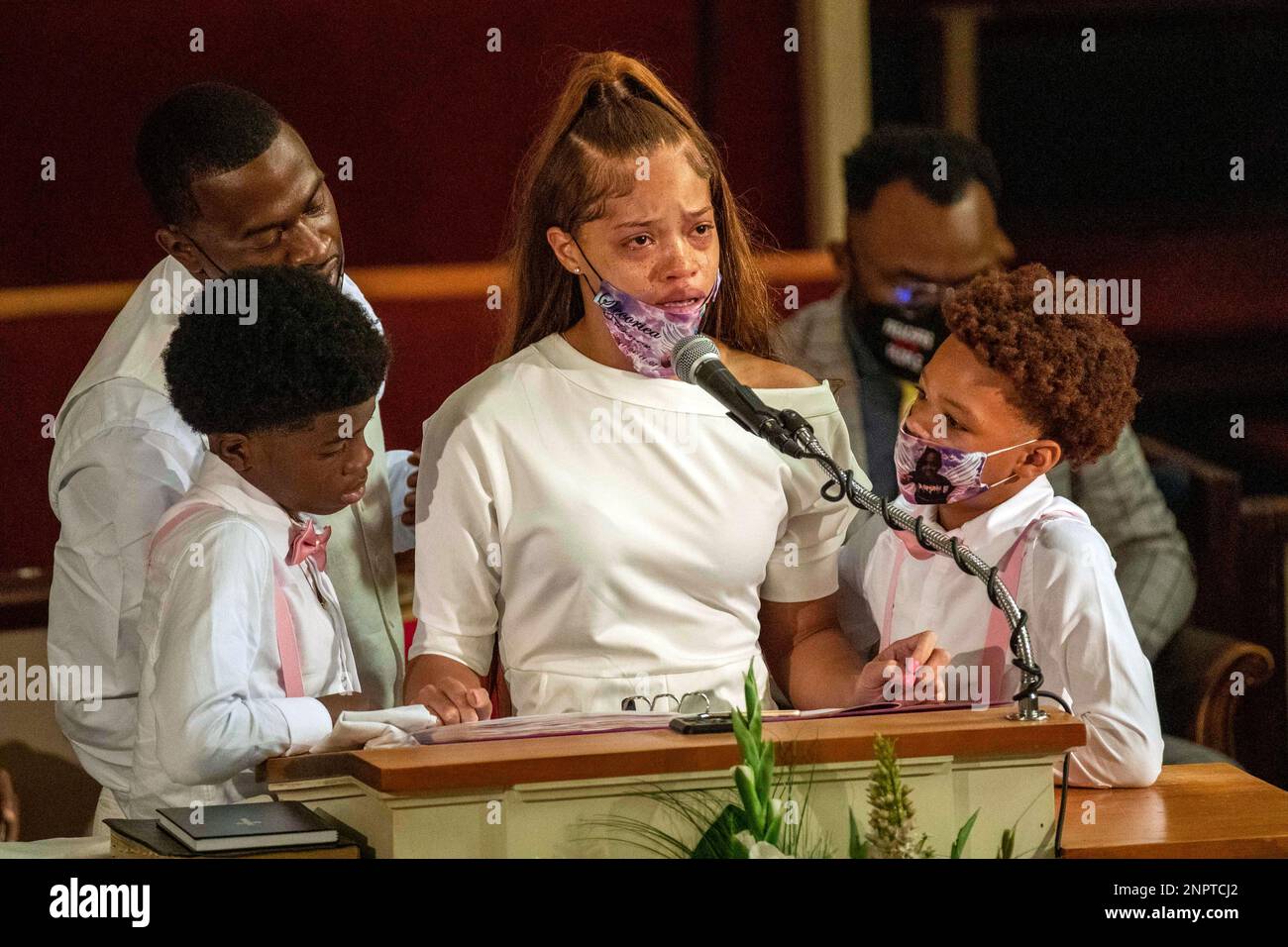 Charmaine Turner, center, mother of Secoriea Turner, is surrounded by ...