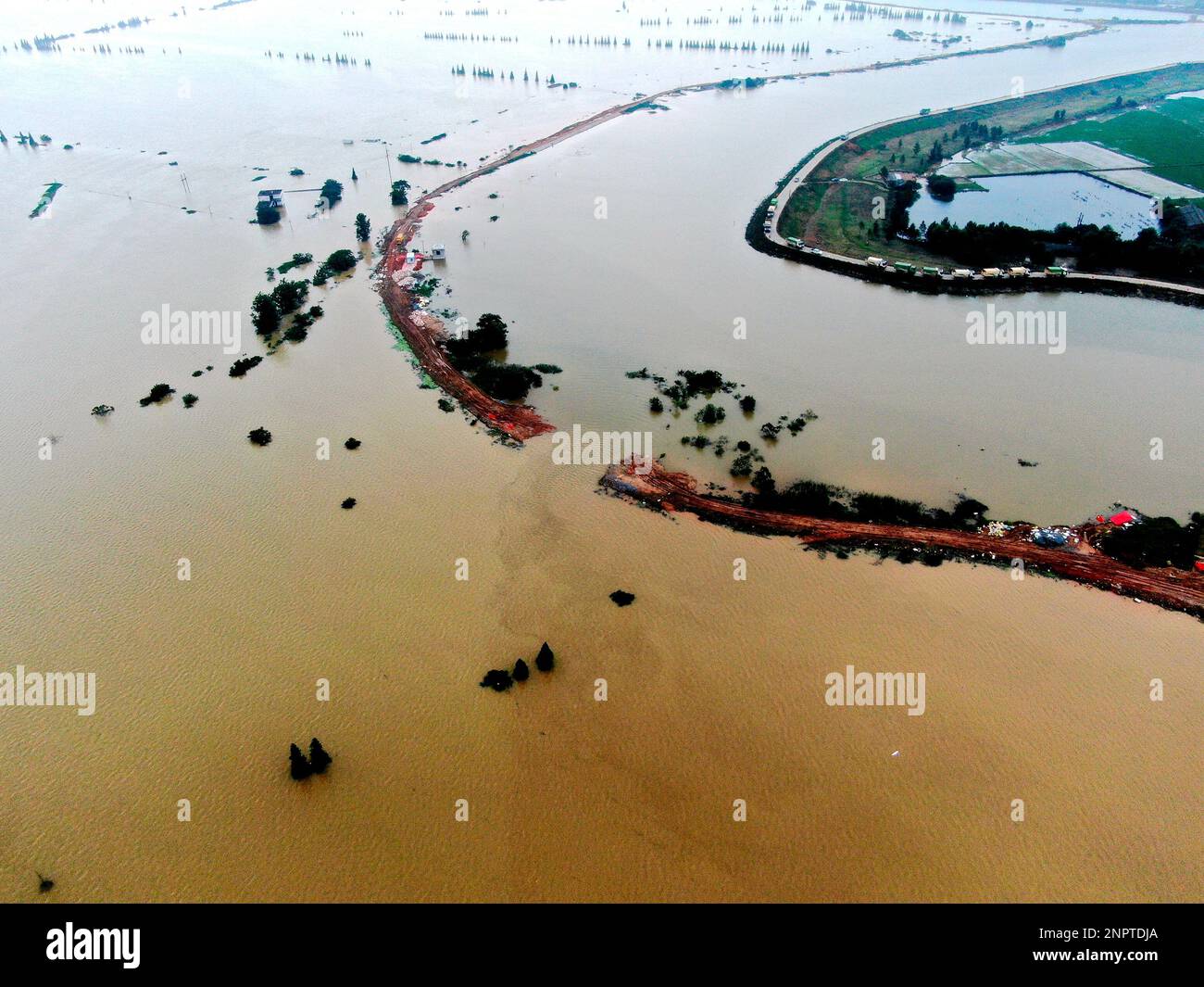 The triangle dike was broken by the flood in Xiuhe,Jiangxi,China on ...