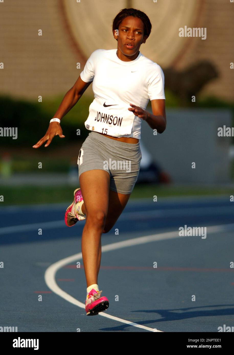 Shanta Johnson of Gaston Airport High wins girls' 400-meter heat in 55. ...