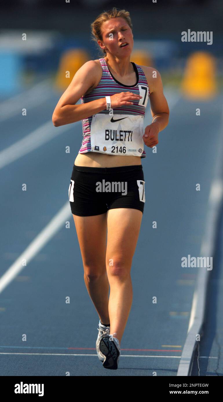 Heather Buletti wins the girls' mile race walk in a meet-record 7:00.87 ...