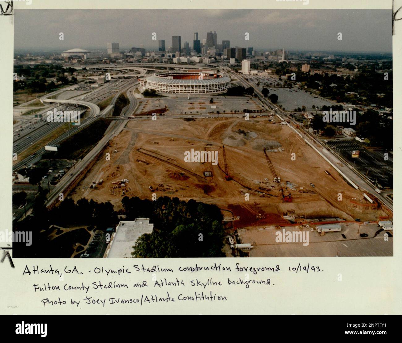 Construction of Olympic Stadium with Fulton County Stadium and Atlanta ...