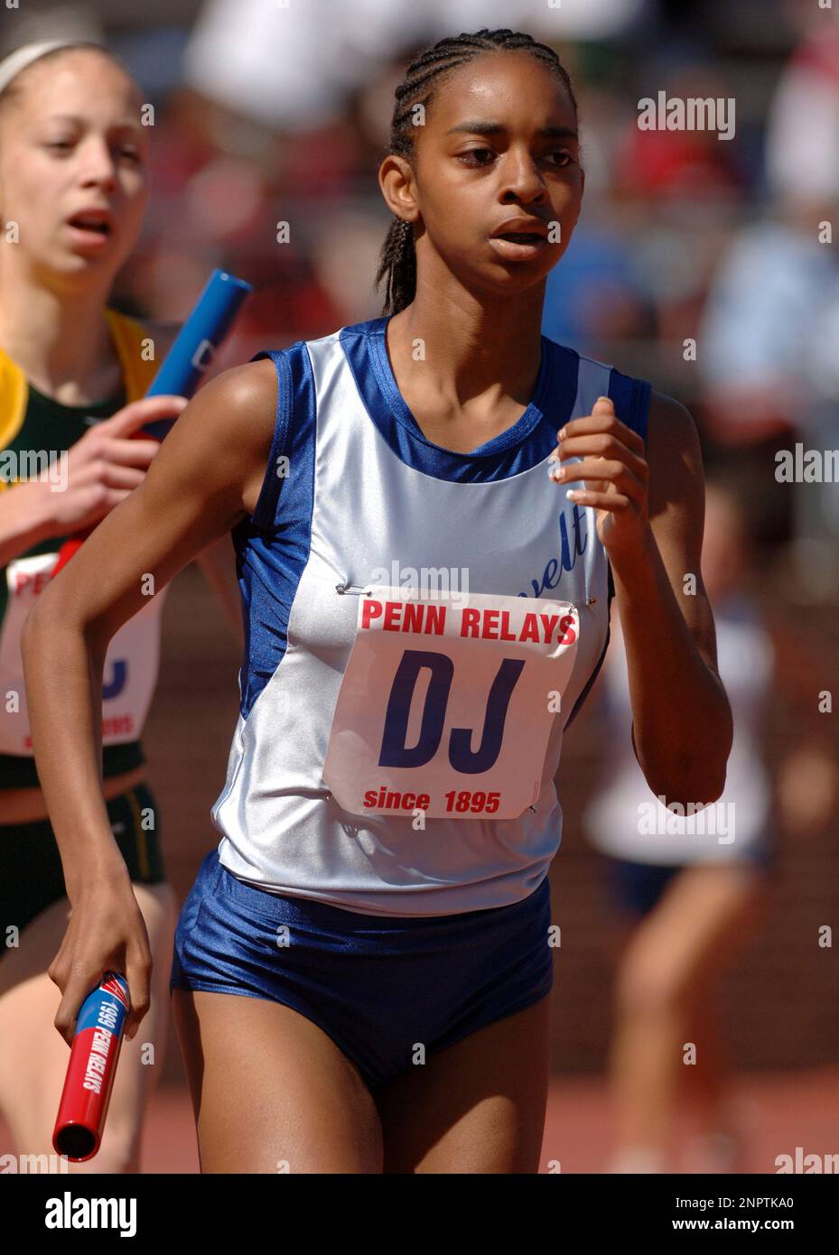 Tekisha Rivers runs the opening leg of Eleanor Roosevelt High winning ...