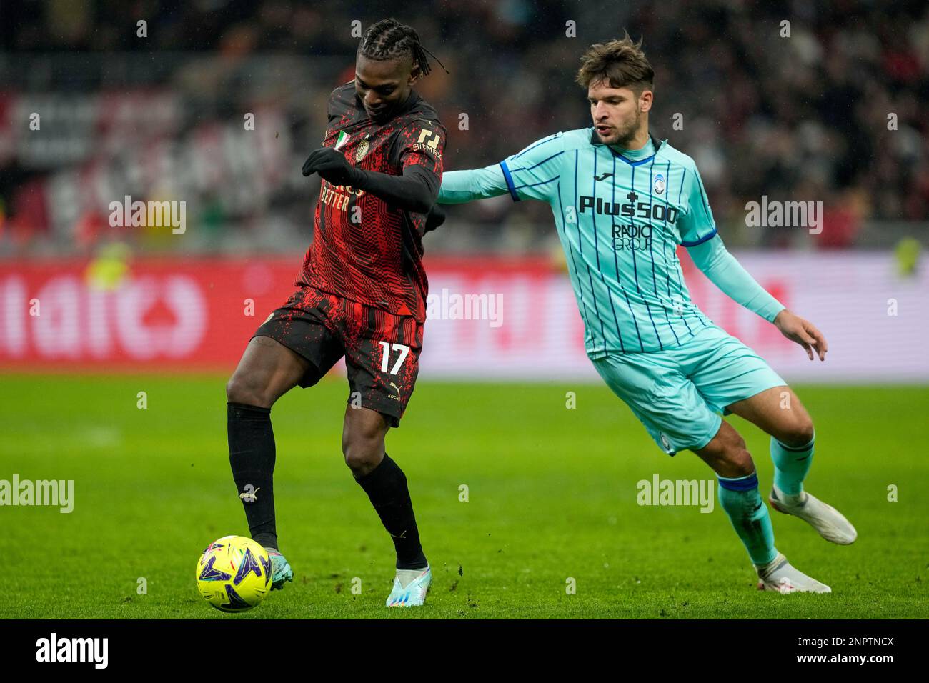 Ac Milans Rafael Leao Left And Atalantas Berat Djimsiti Fight For