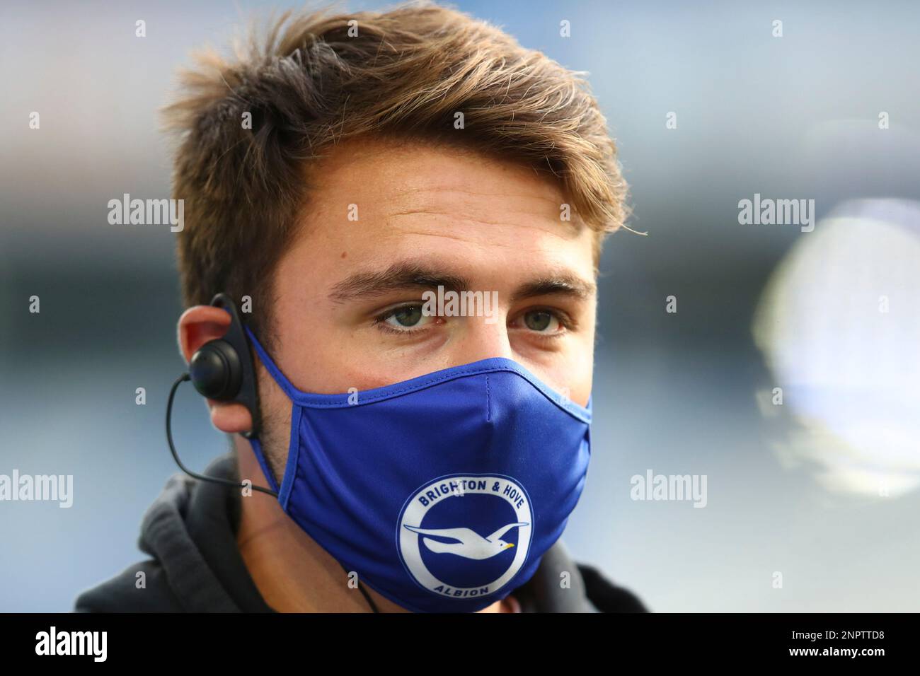 Brighton ground staff wears a face mask ahead of the English Premier ...