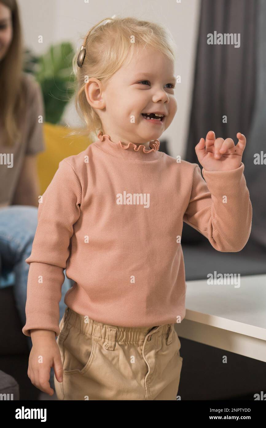 Cochlear implant system. Installation cochlear implant on child girl ...