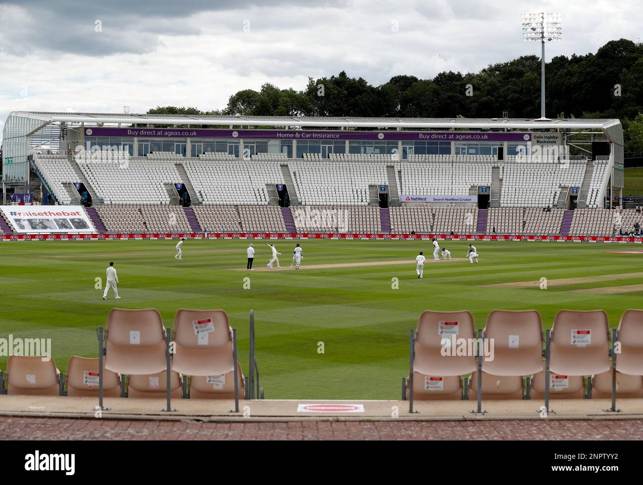 England's Dom Bess bowls a delivery during the third day of the first ...