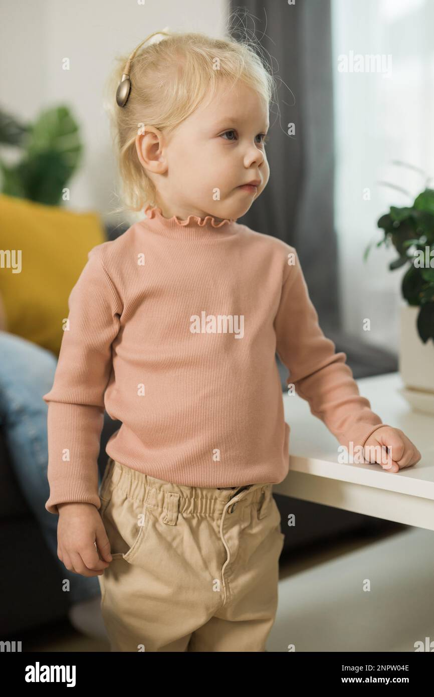 Cochlear implant system. Installation cochlear implant on child girl ...