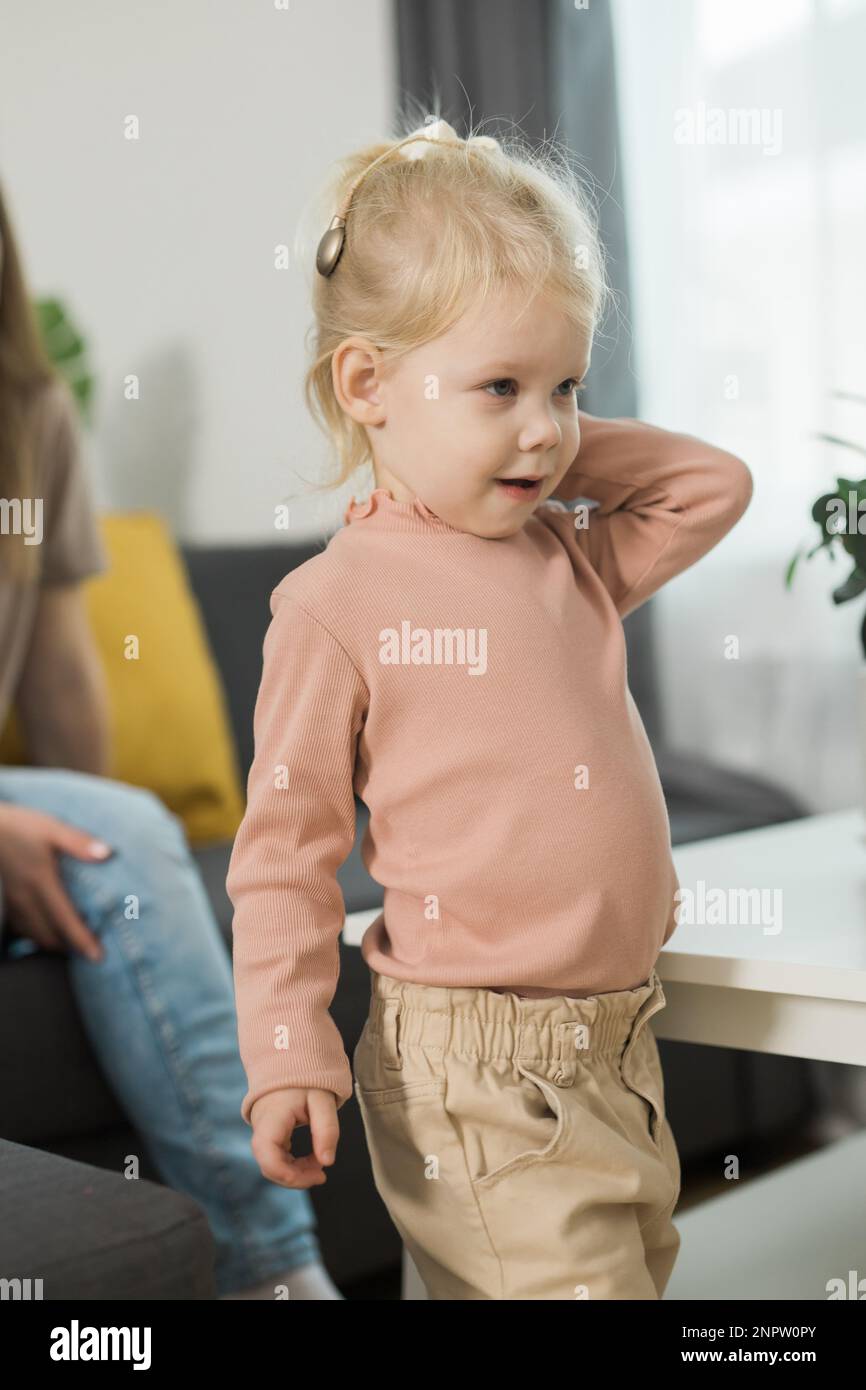 Cochlear implant system. Installation cochlear implant on child girl ...