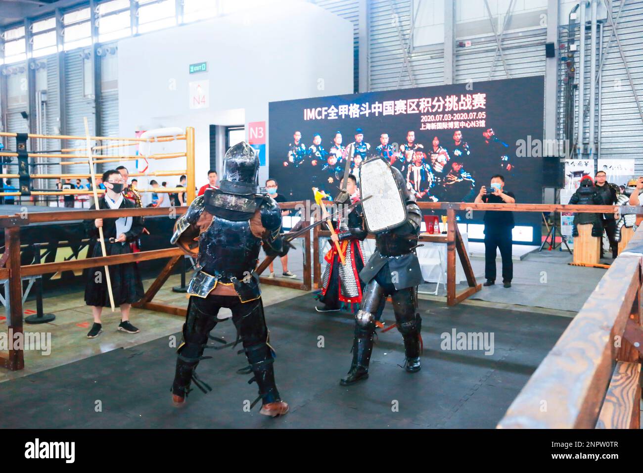 Contestants fight in a China zone tryout for the International Medieval ...