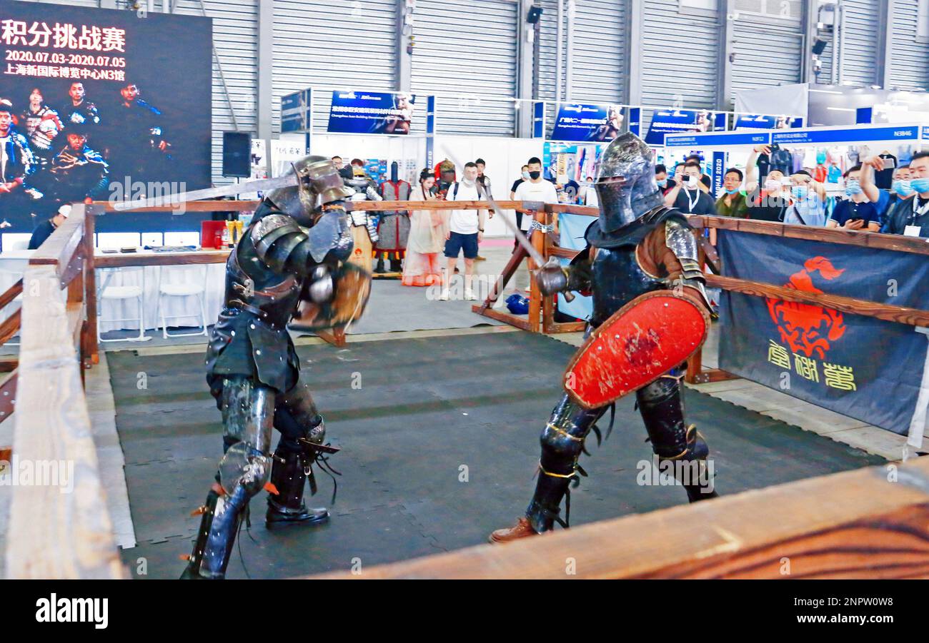 Contestants fight in a China zone tryout for the International Medieval ...