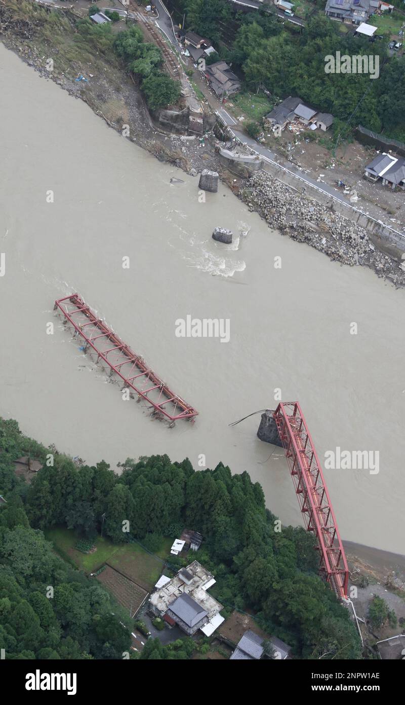 An aerial photo shows a collapsed bridge in Kuma, Kumamoto Prefecture ...