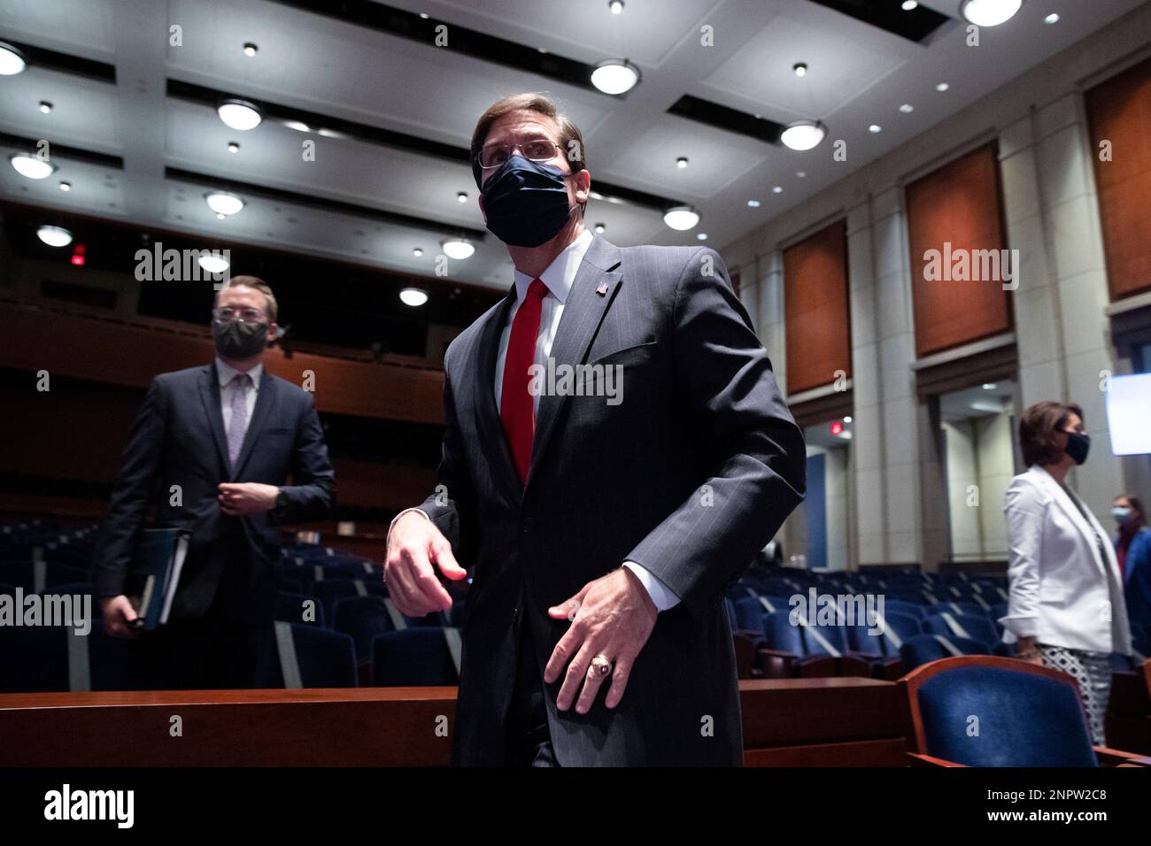 Defense Secretary Mark Esper leaves after a House Armed Services ...