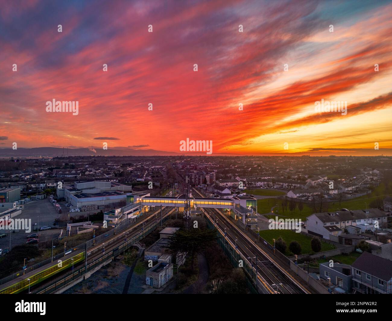 Fiery red sunset sky over Howth Junction & Donaghmede station Stock ...