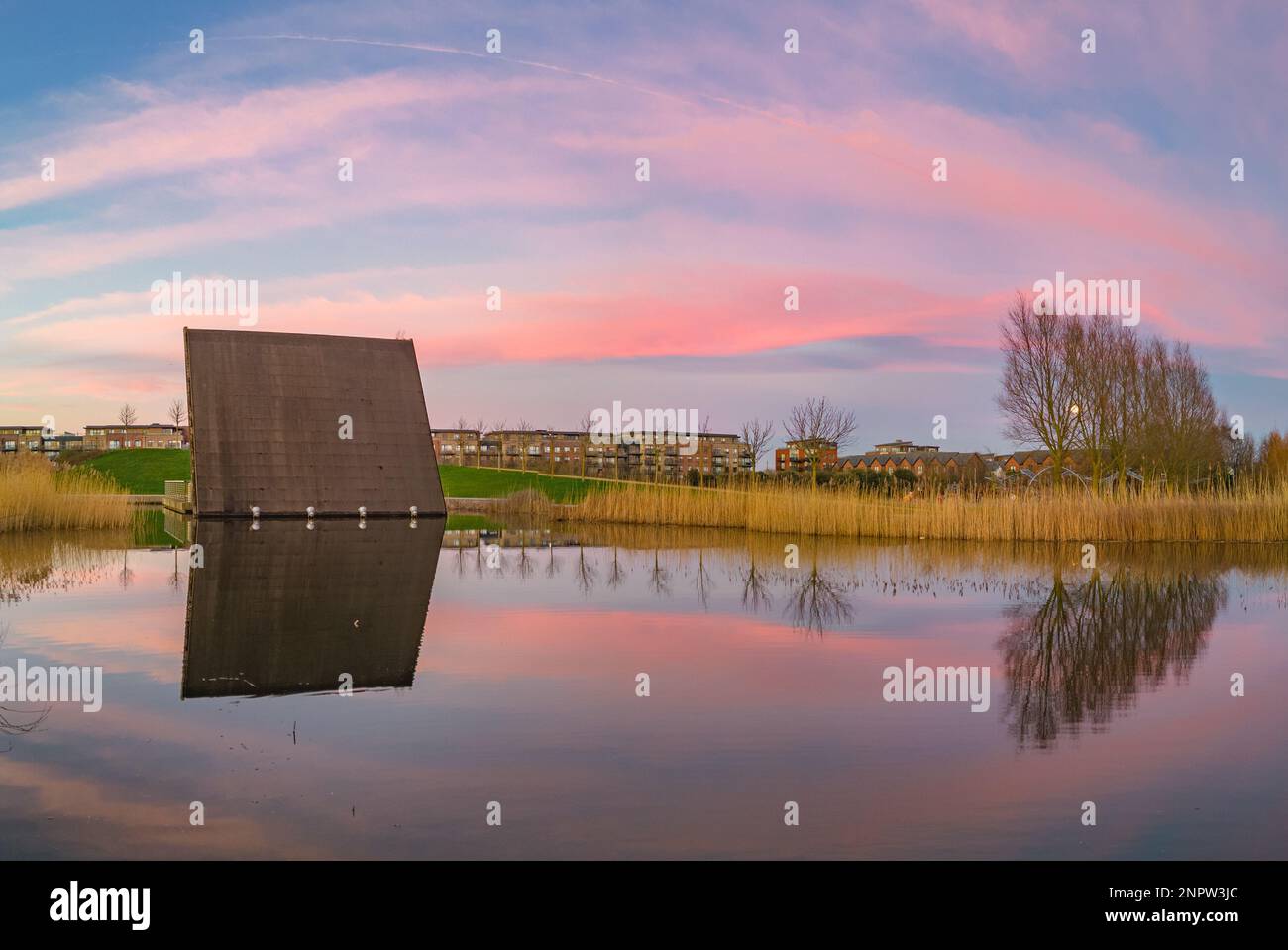 Pink sky reflections in Father Collins Park Stock Photo - Alamy