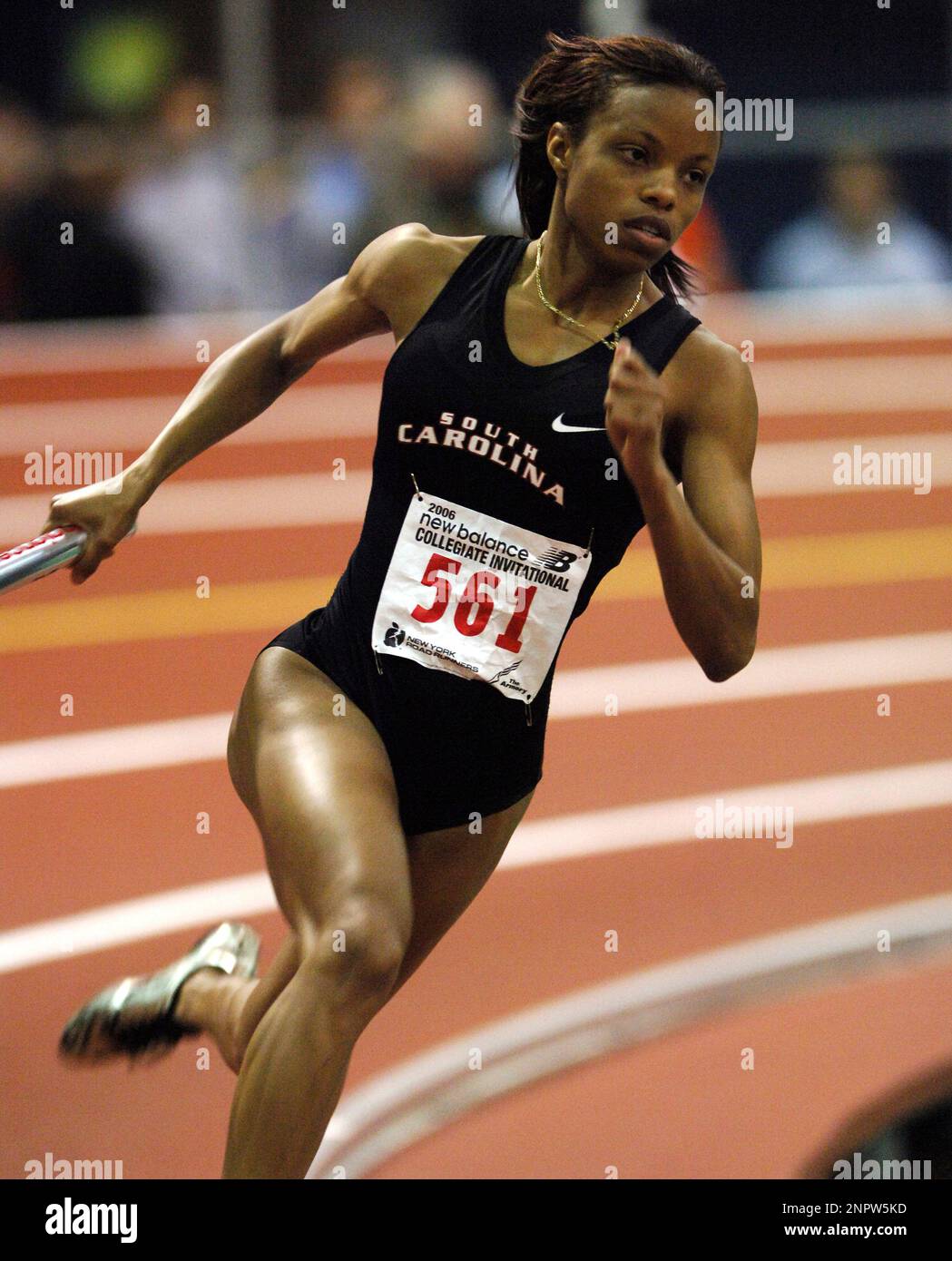 Shay Shelton runs the third leg of of South Carolina's heat-winning 4 x ...