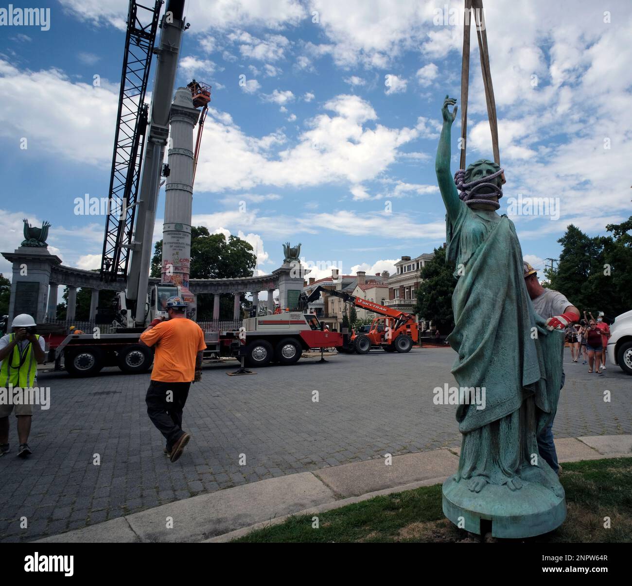 The statue from the Jefferson Davis monument, background, stands on the ...