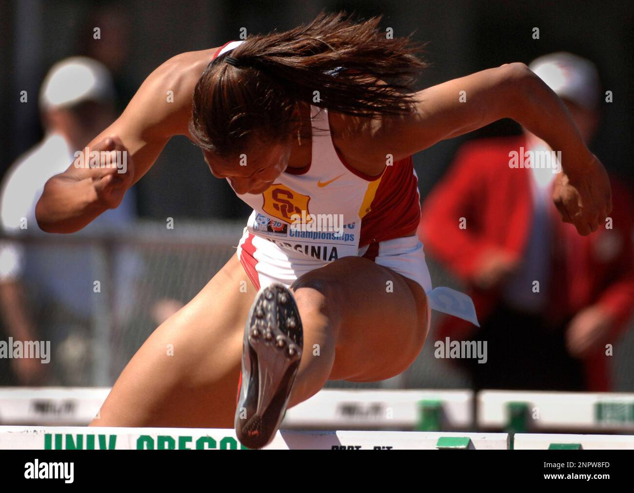 Virginia Powell of USC wins the women's 100-meter hurdles in 12.64 in ...