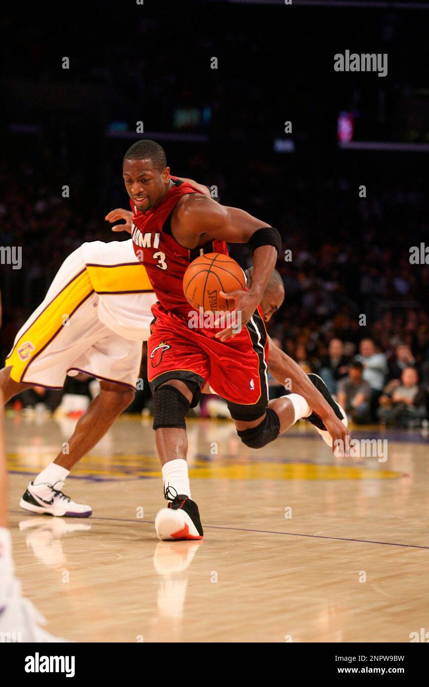 Miami Heat guard Dwayne Wade (3) makes a move with the basketball ...
