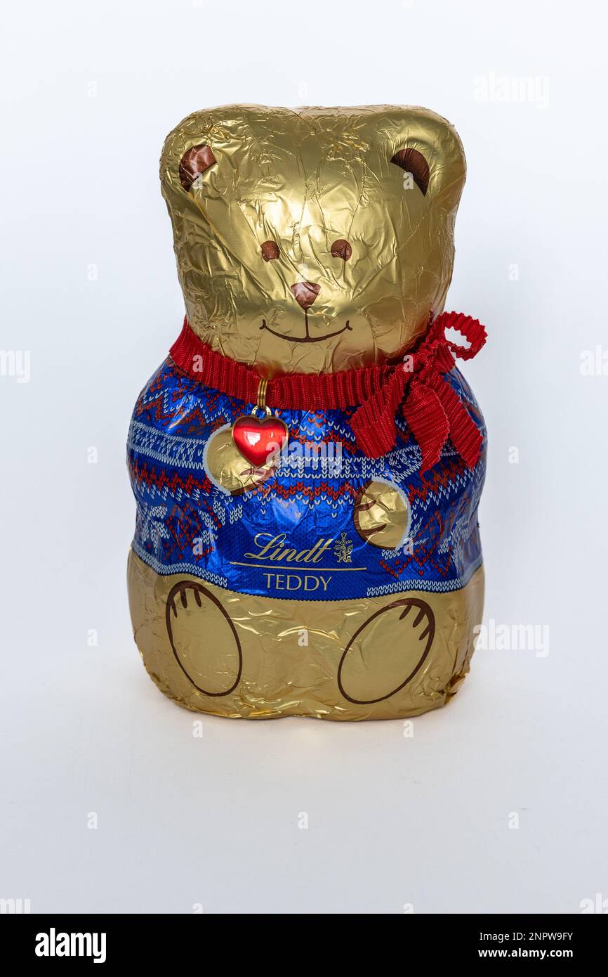 Lindt chocolate bear with blue jumper isolated on a white background ...