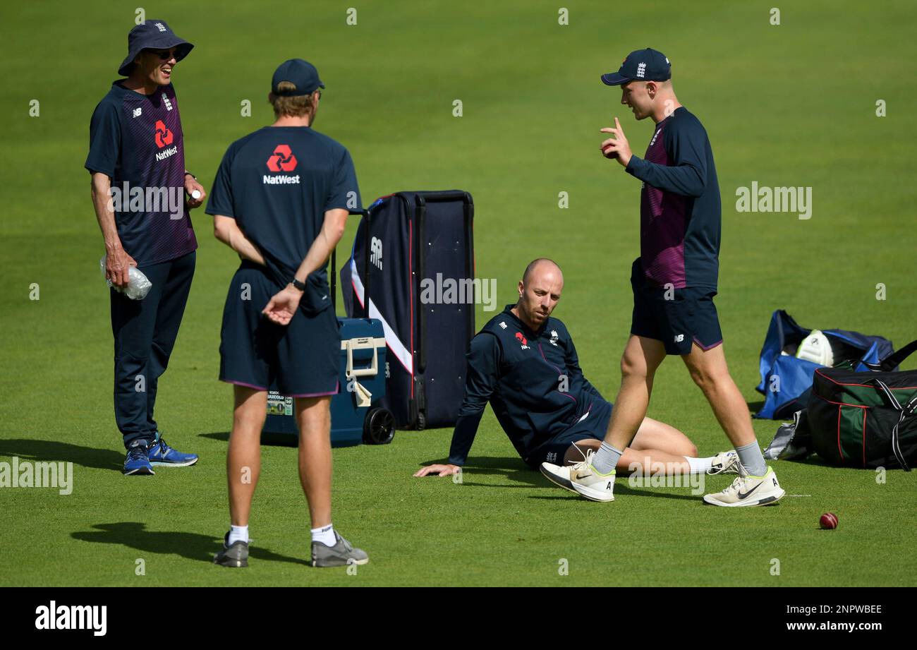 England cricket team members Dom Bess, right, speaks with Mark Saxby ...