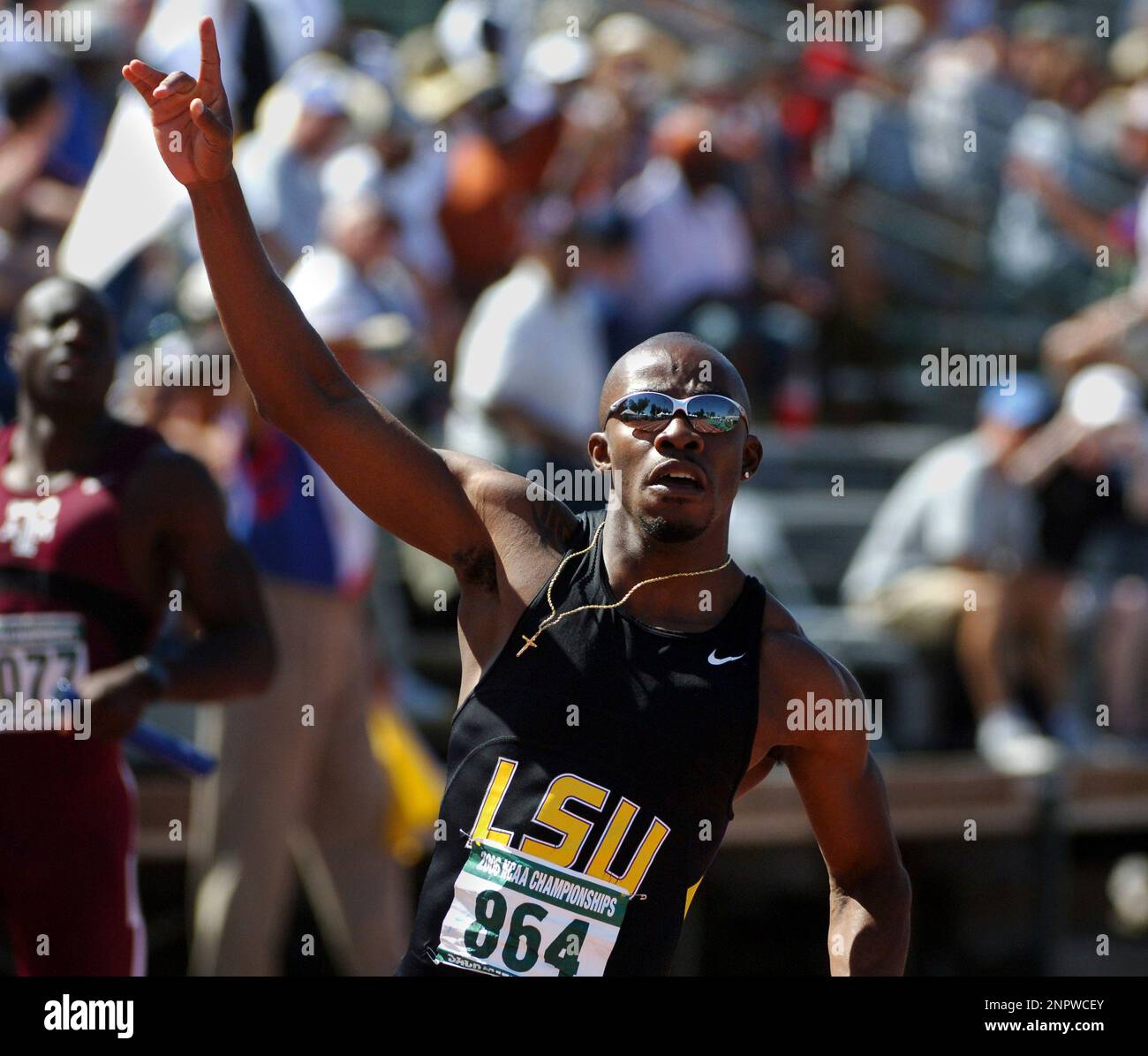 Kelly Willie celebrates after anchoring LSU to victory in the 4 x 100 ...