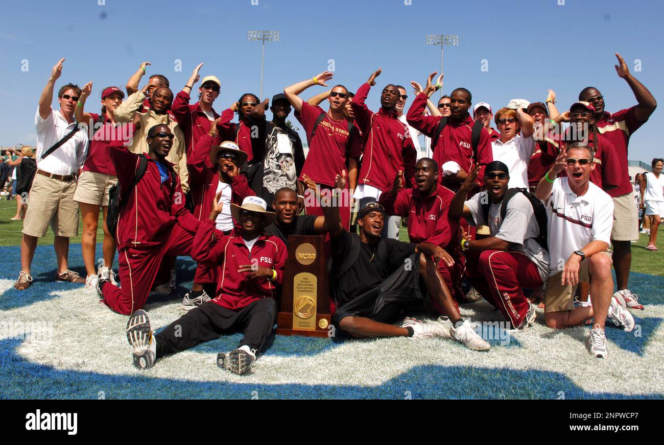 The Florida State men pose for a team photo after winning the team ...