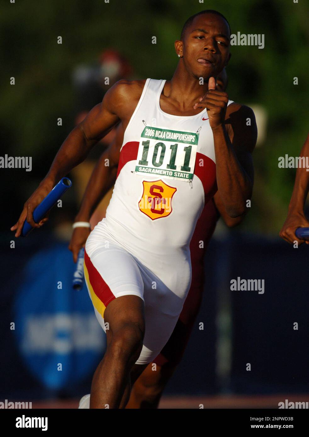 Da'Sean Cunningham runs the tihrd leg of USC 4 x 400-meter relay that ...