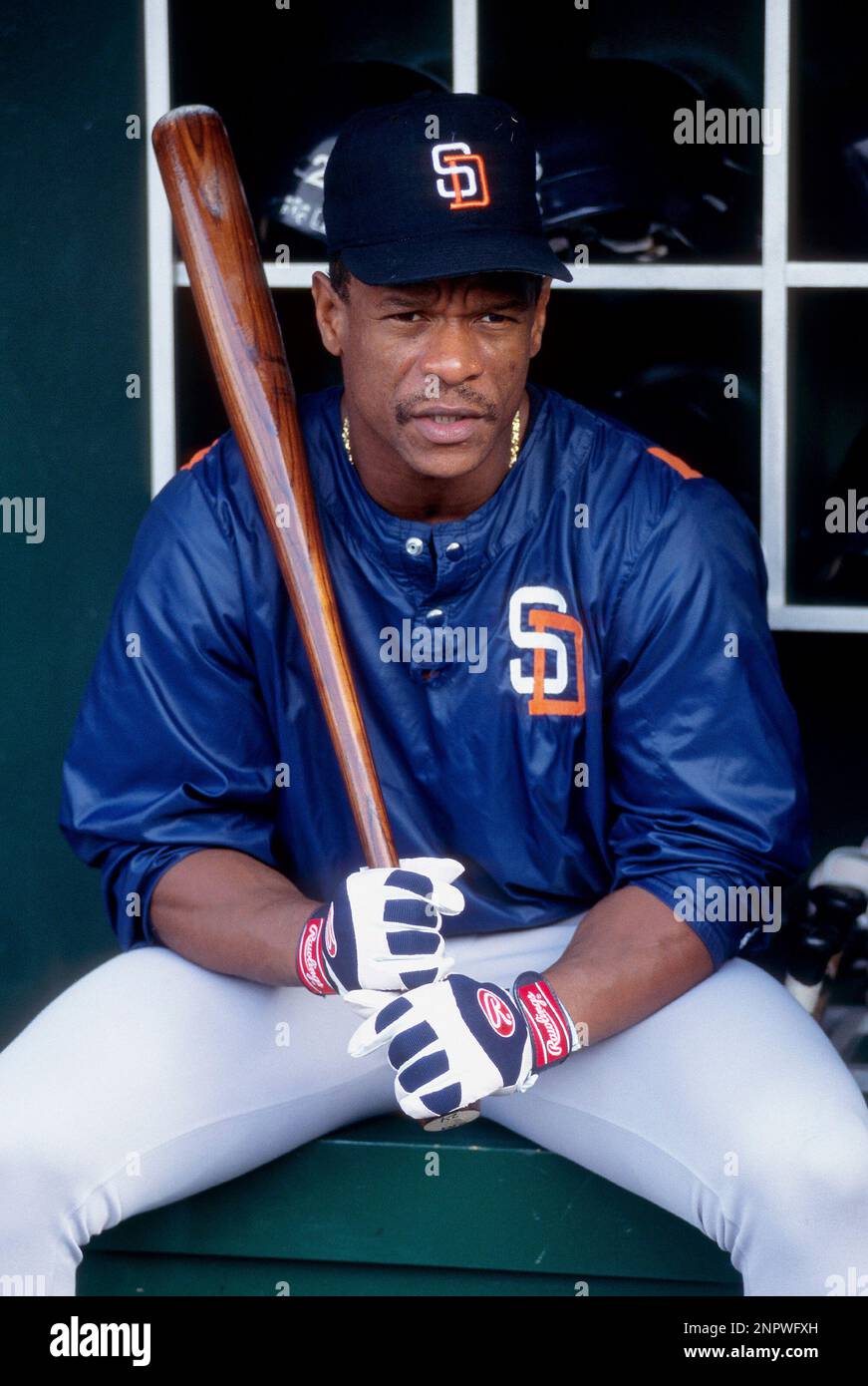 12 Jun. 1997: San Diego Padres outfielder Rickey Henderson (24) sits on ...