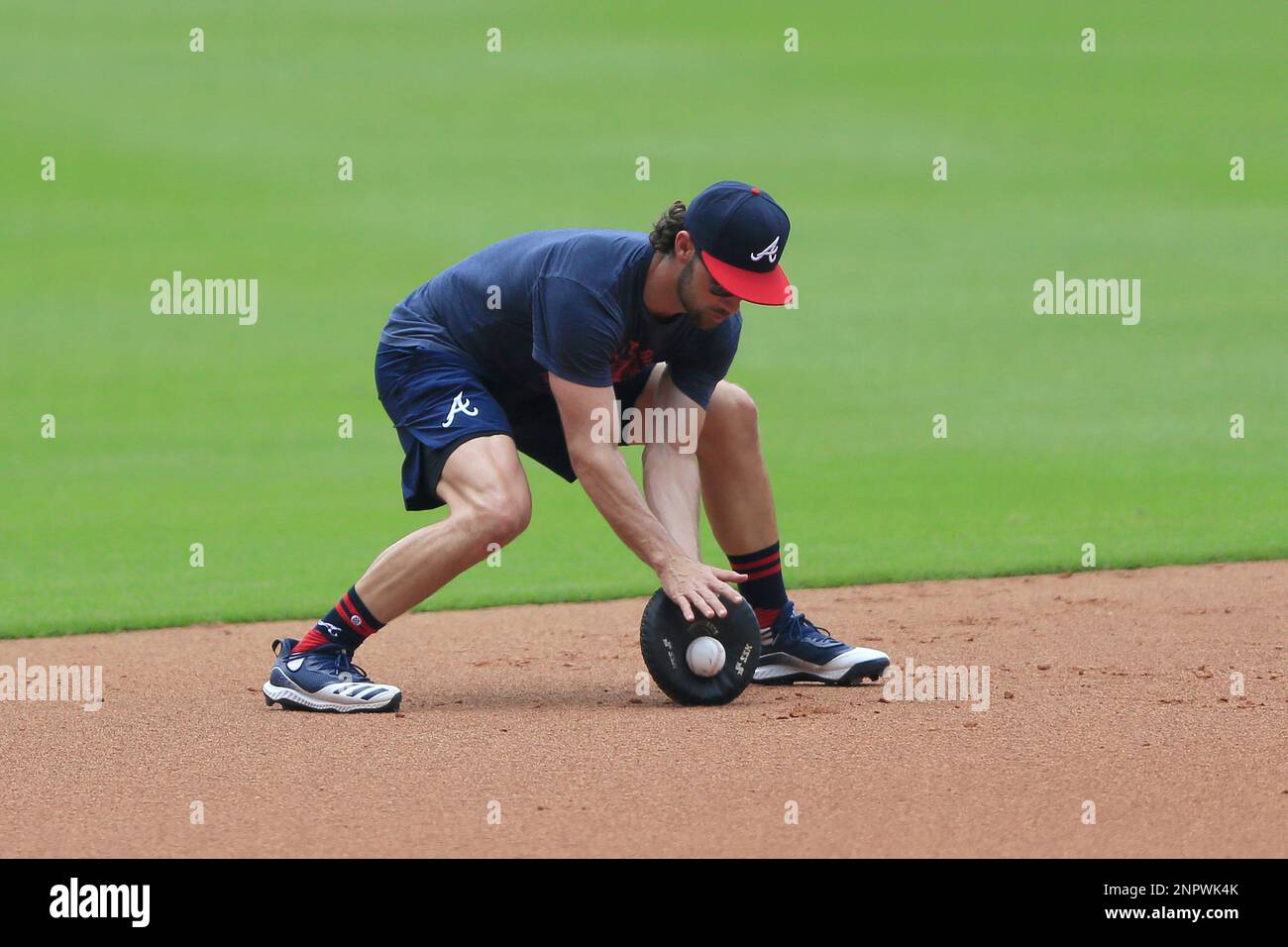 ATLANTA, GA - JULY 04: Charlie Culberson fields grounders during Day 2 ...