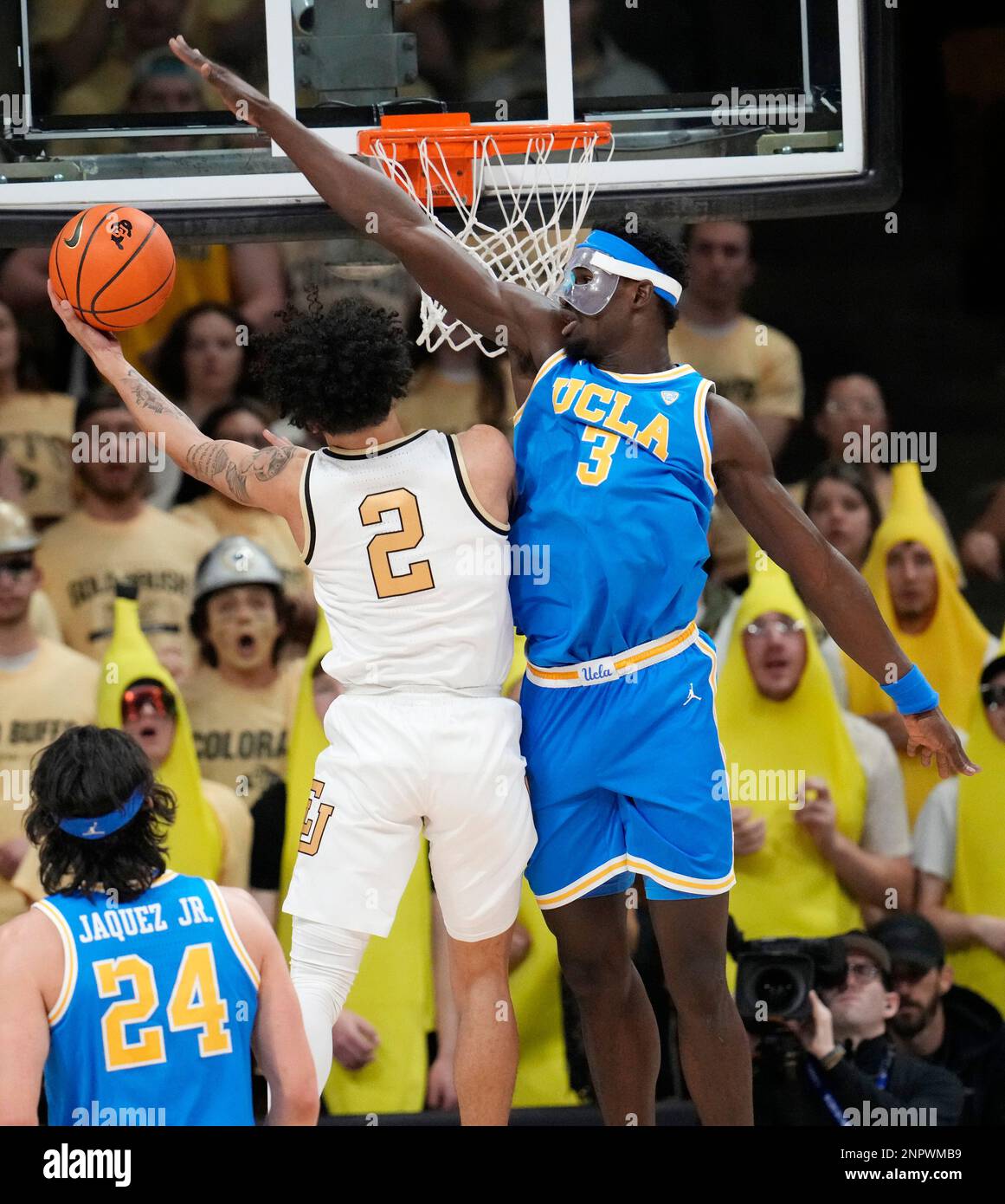 UCLA forward Adem Bona, right, goes up to block a shot by Colorado ...