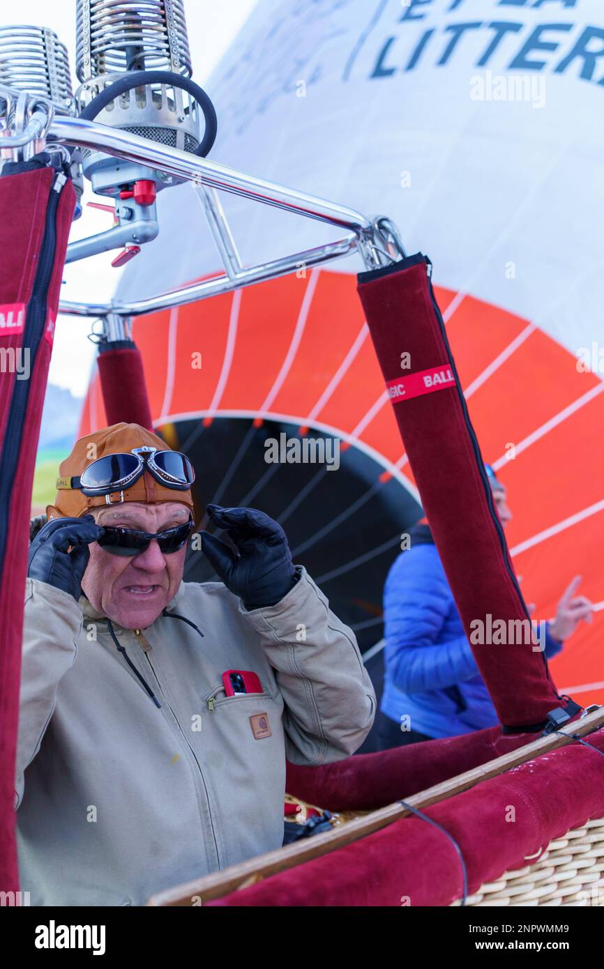 An airman putting on sunglasses. Taken at 42nd International Balloon ...