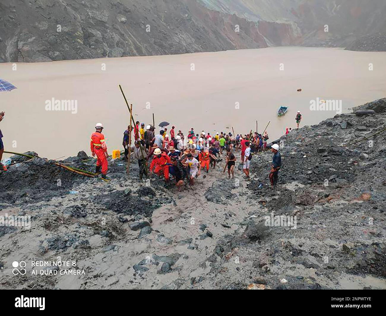 In this photo released from Myanmar Fire Service Department, rescuers ...