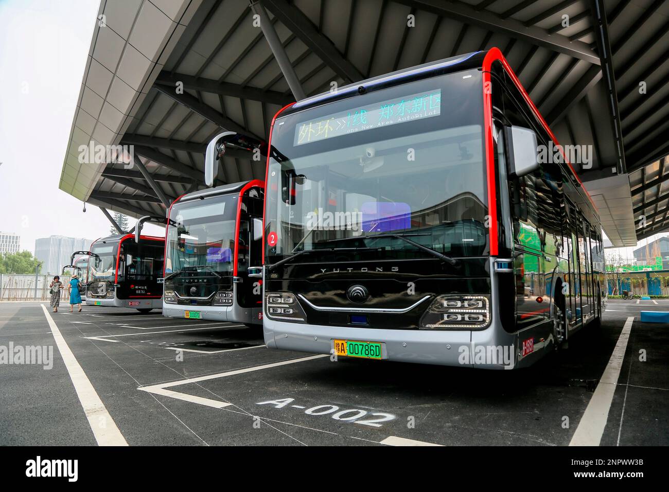 A view of the electric L3 autonomous buses runs at its terminal in ...