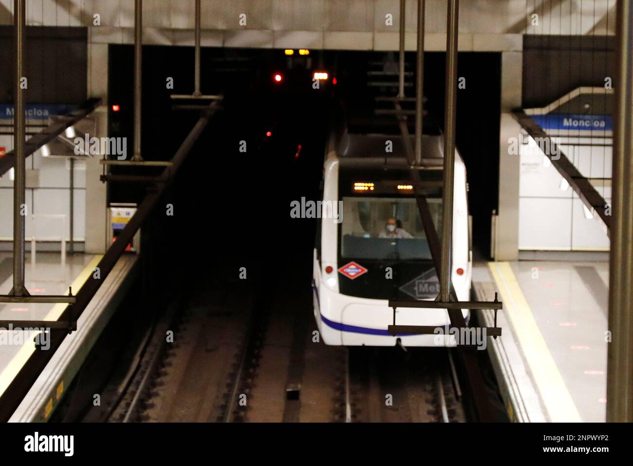 An underground enters through the station of line 6 of the Moncloa ...