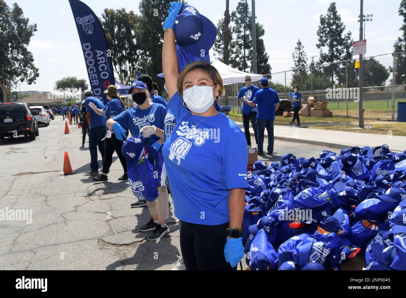 Netflix actress Annie Gonzalez greets motorists at the Dodger Day Drive ...