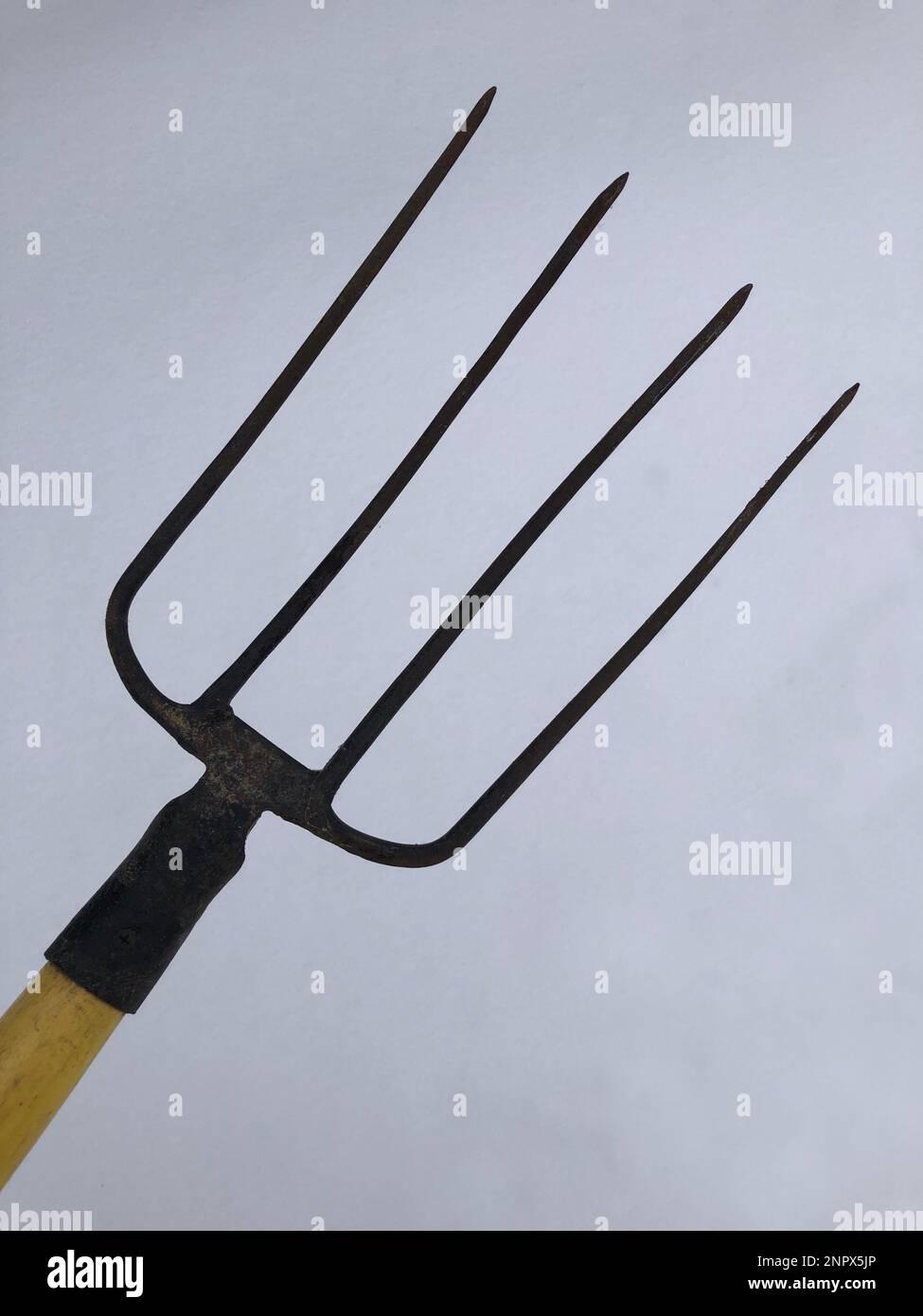 sharp pitchfork up prick on white background, defiance concept Stock ...