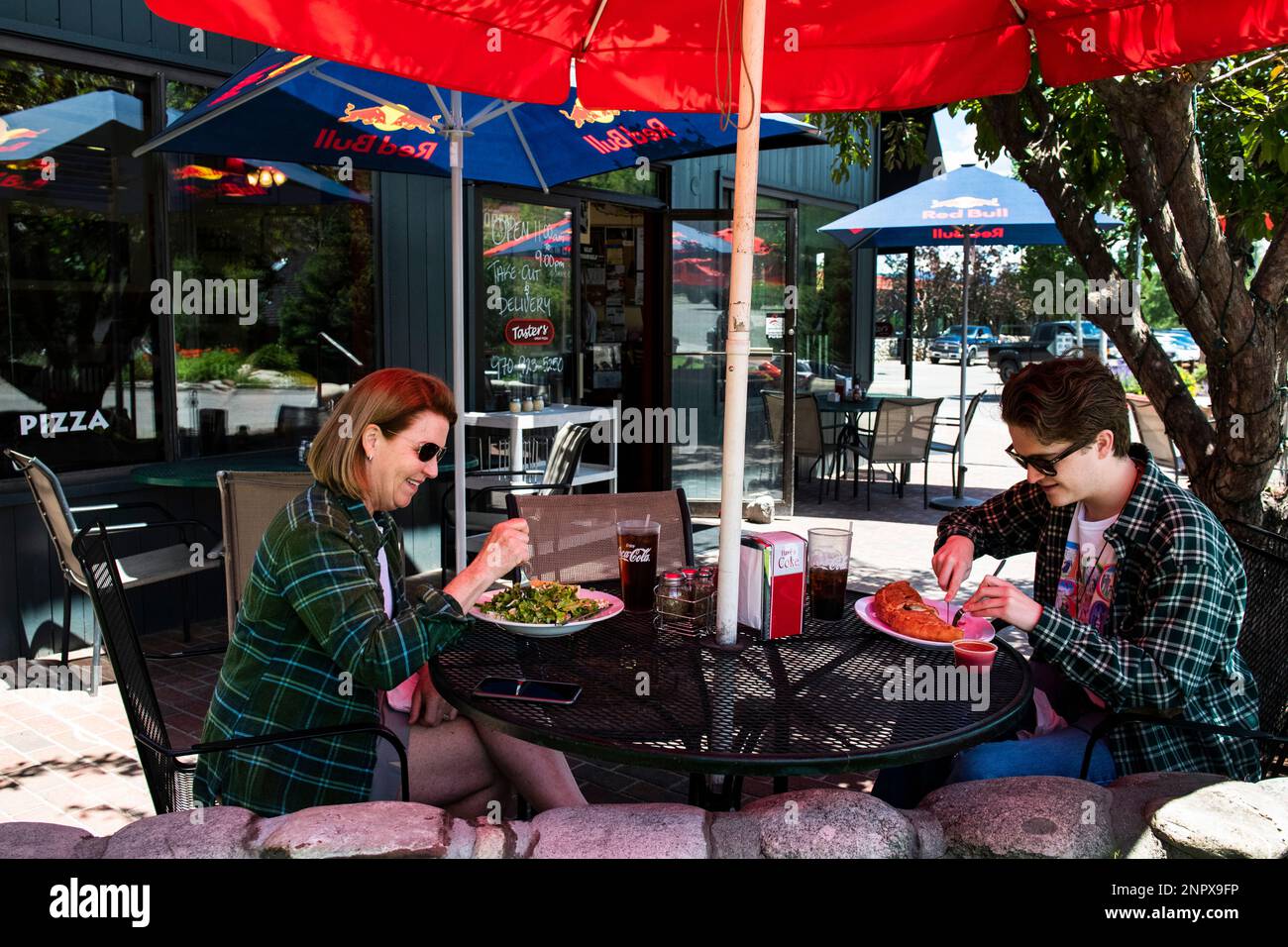 Elizabeth Hunsaker, left, and her son Kevin Hunsaker enjoy a meal on ...