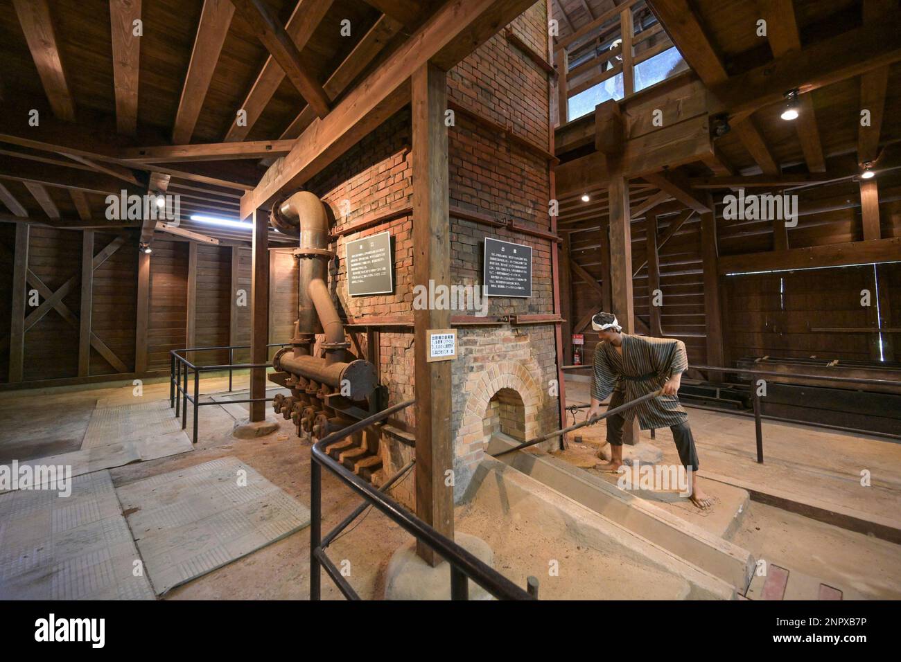 A picture shows the life-size display of the Tatara furnace at Okuizumo ...