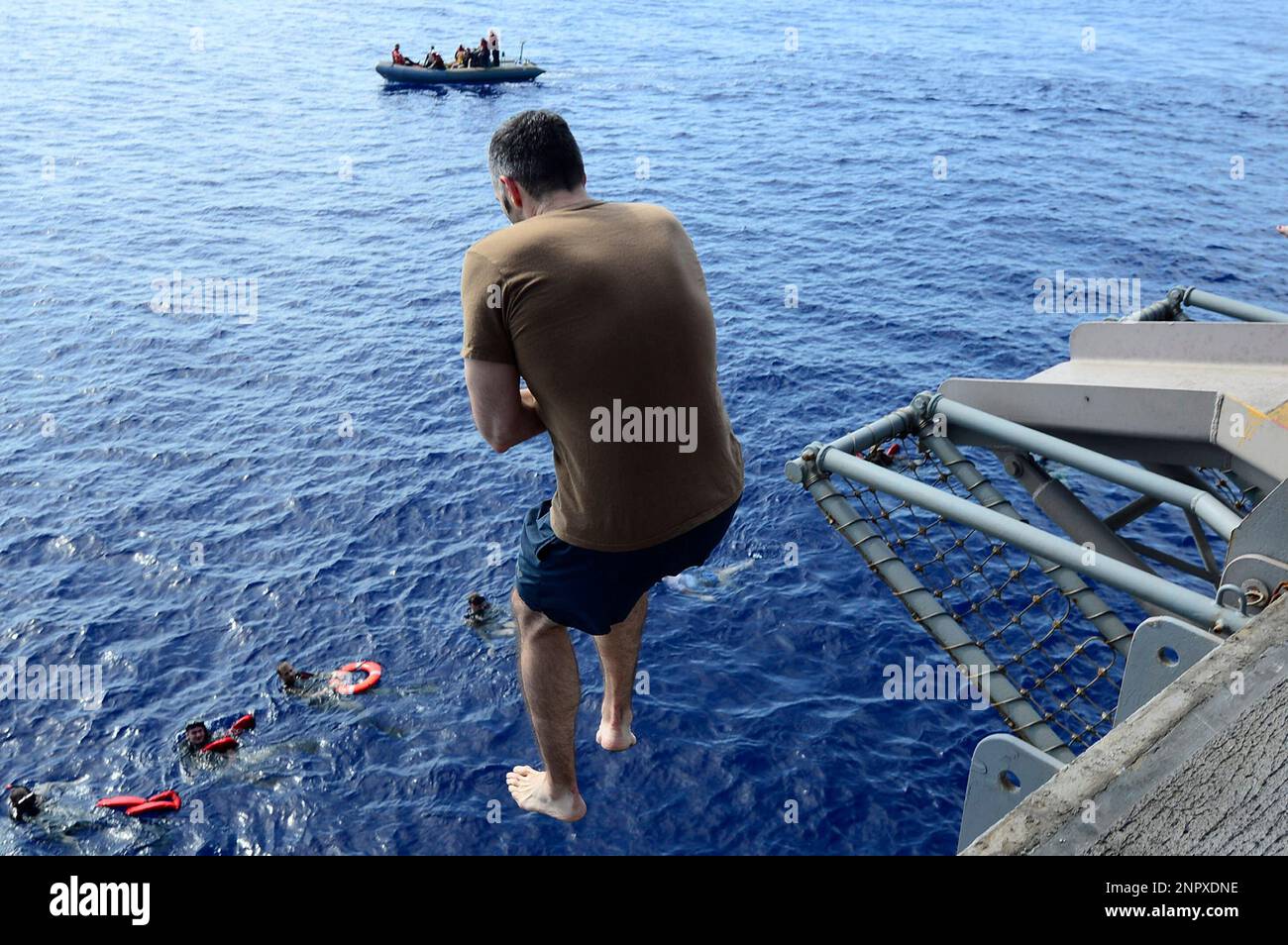 In this May 16, 2020, photo provided by the U.S. Navy, Sailors ...