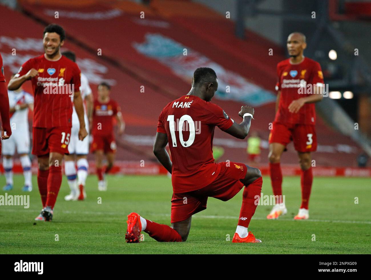 Liverpool's Sadio Mane celebrates scoring his side's fourth goal during ...