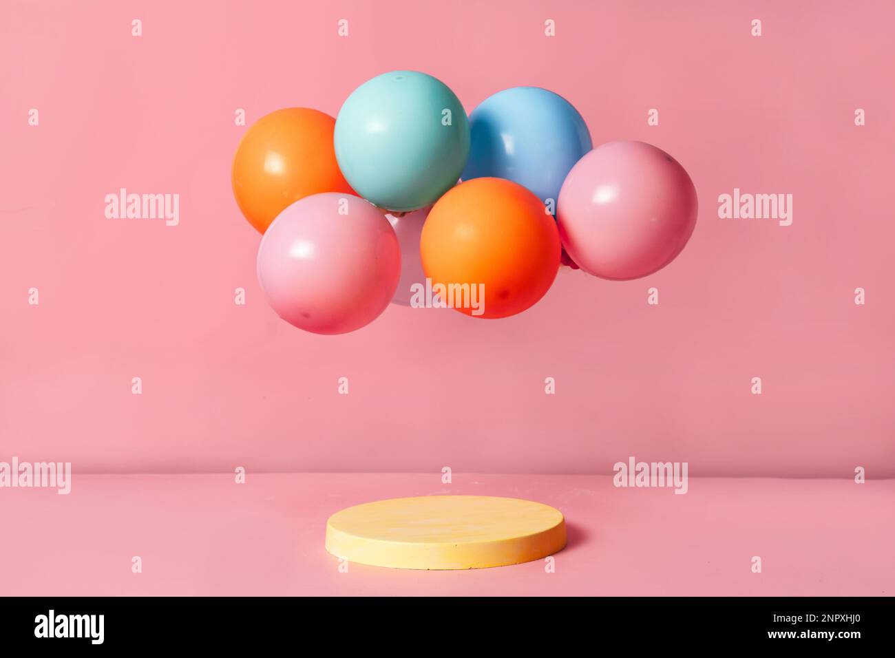 Product podium stage with pastel color balloons Stock Photo - Alamy