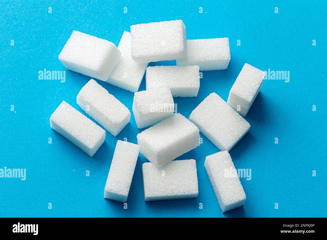 Sugar Cubes in Blue: Adding Sweetness to Your Day Stock Photo - Alamy