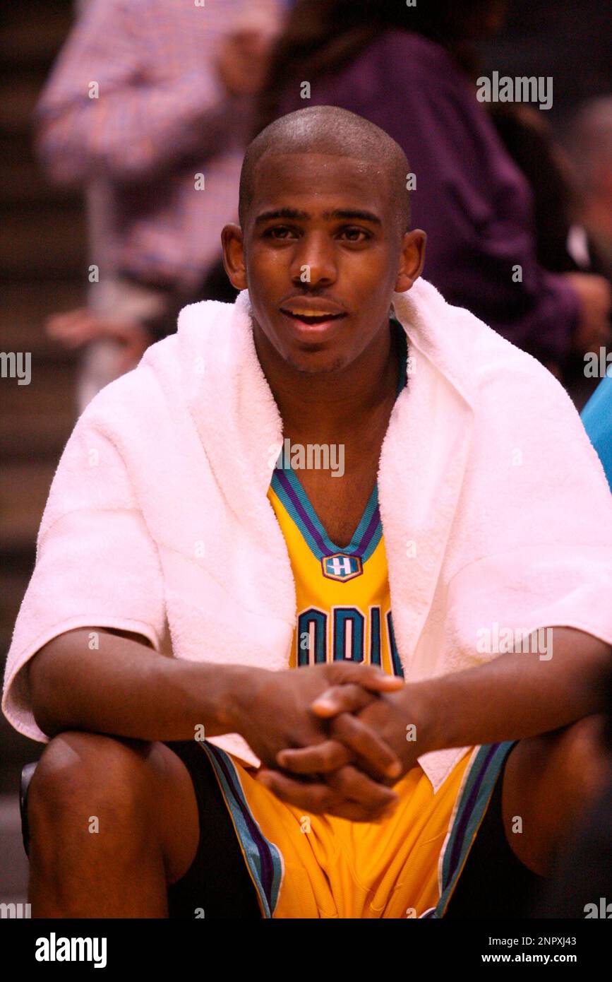 New Orleans/Oklahoma City Hornets guard Chris Paul (3) takes a break on ...