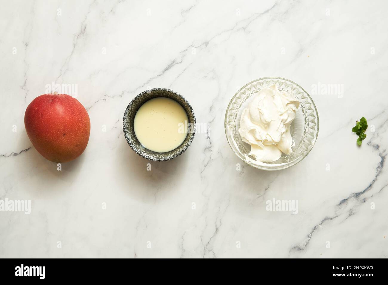 Mango mousse ingredients list: mango, cream, condensed milk and mint ...