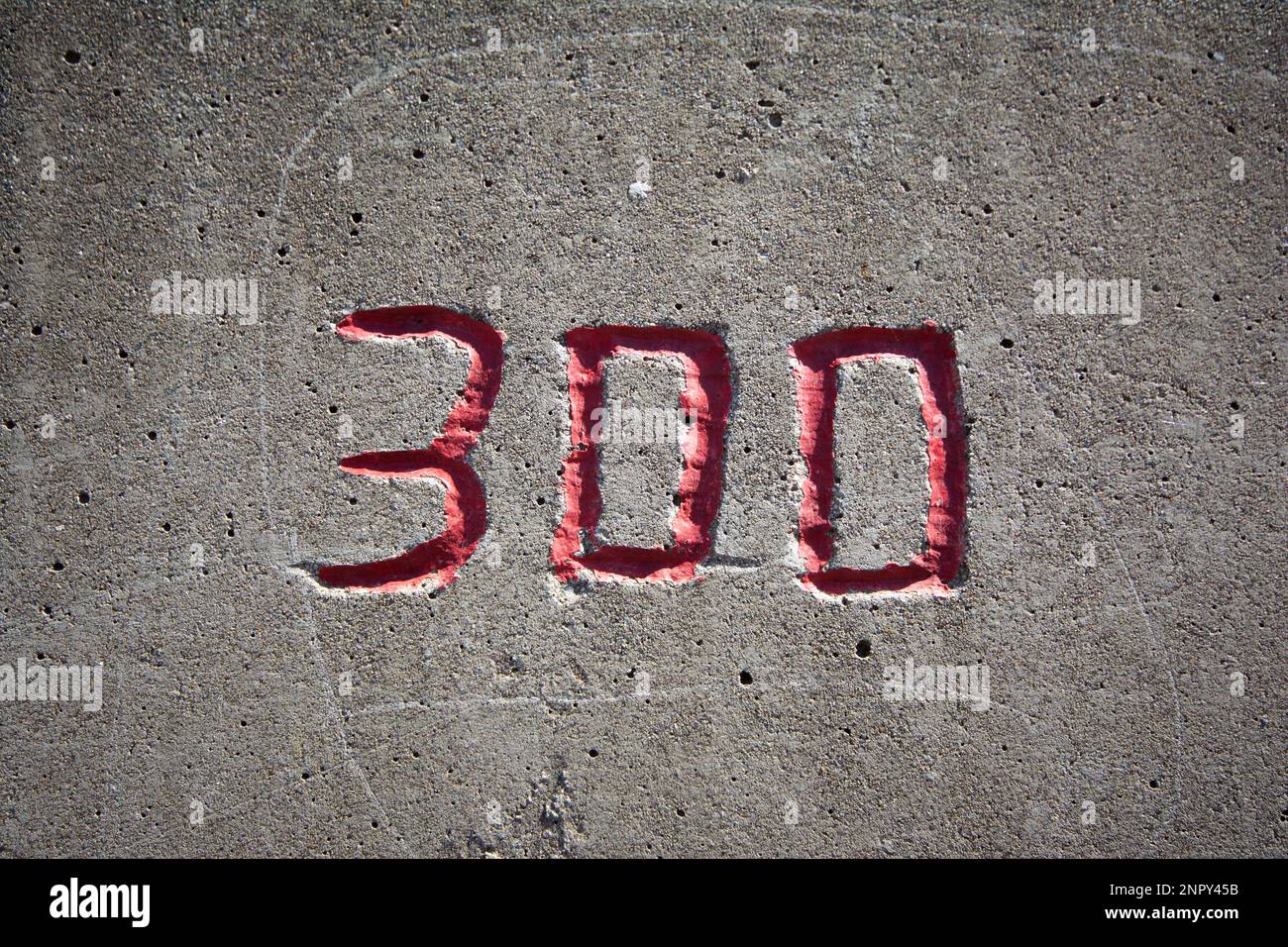 the number 300 carved into a concrete wall in red Stock Photo - Alamy