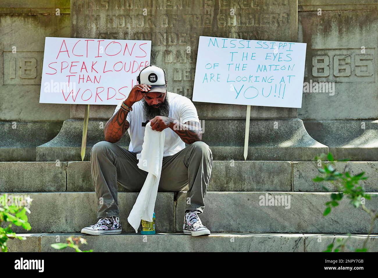 In this Monday, June 15, 2020, photo, John Lewis takes a break from ...