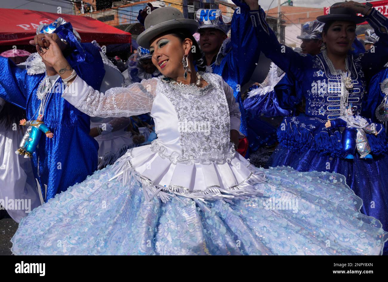 Couples in costume of Chola and Pepino dance as carnival celebrations ...
