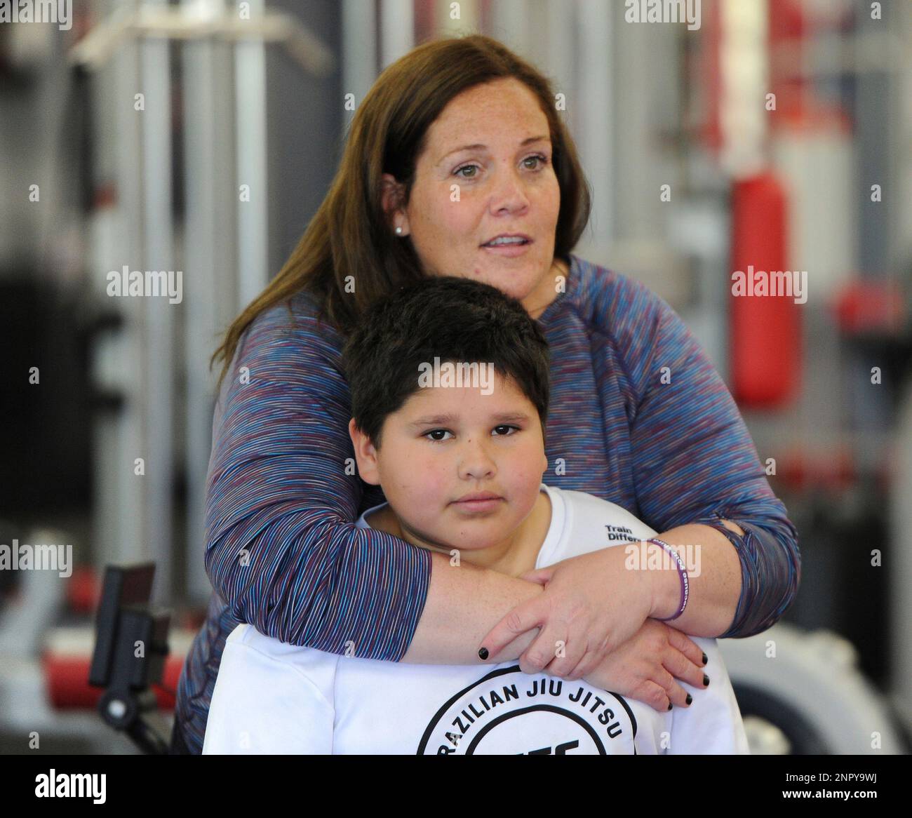 Colleen Tyrrell Llacsa and her son Samuel, 10, work out at the UFC gym ...