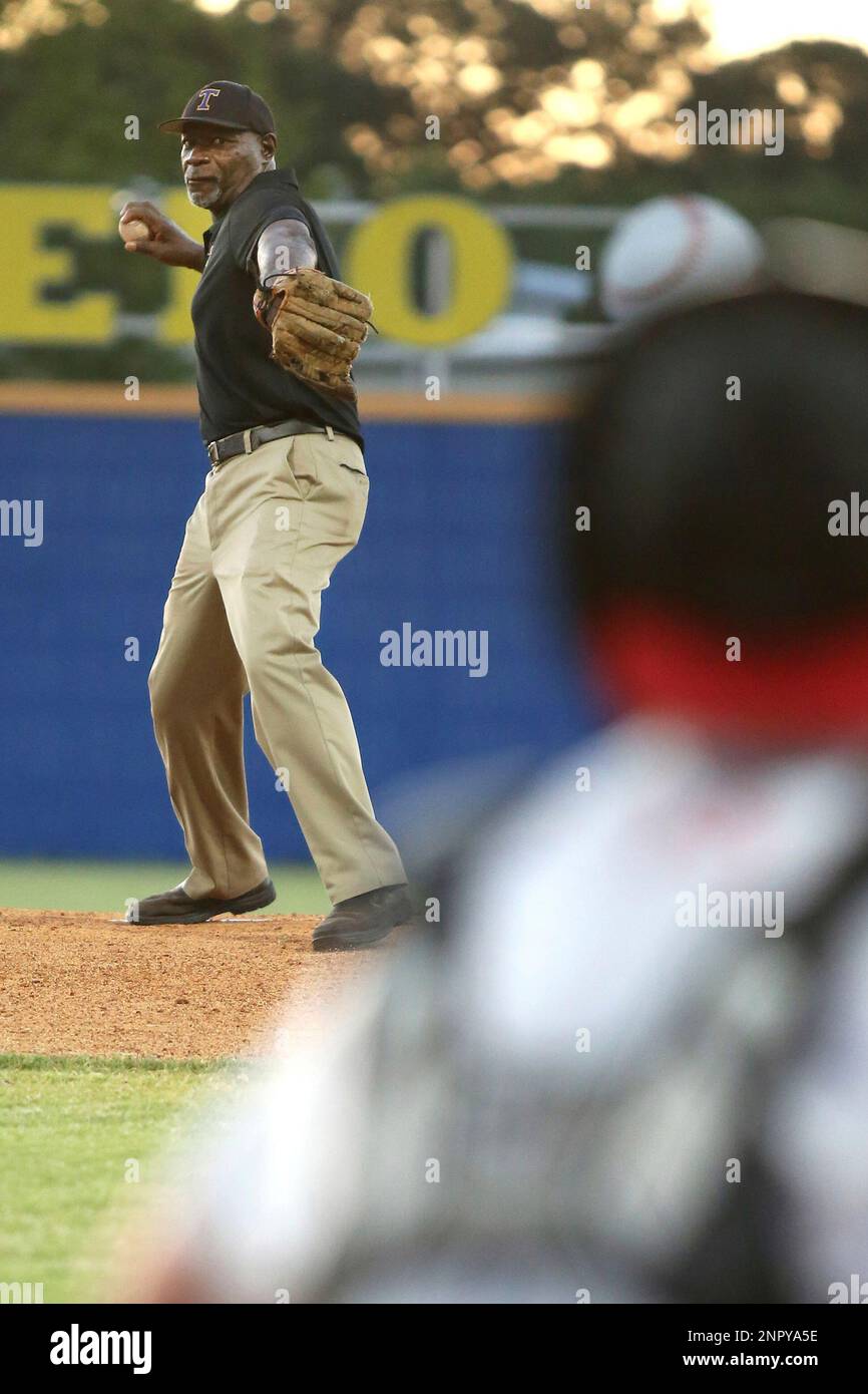Larry Harmon throws out the first pitch Friday night, June 12, 2020, at ...